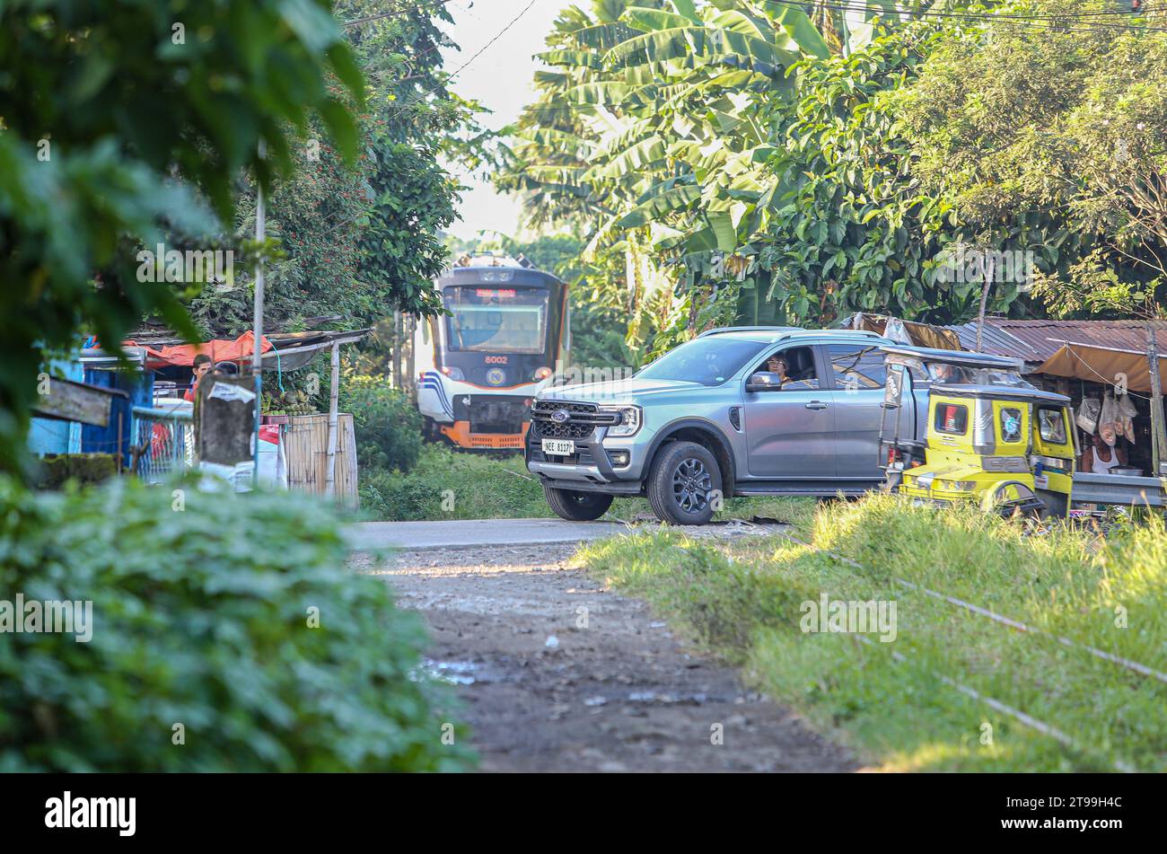 Manila, Philippines. November 24, 2023 : Railroad Crossing with a car ...