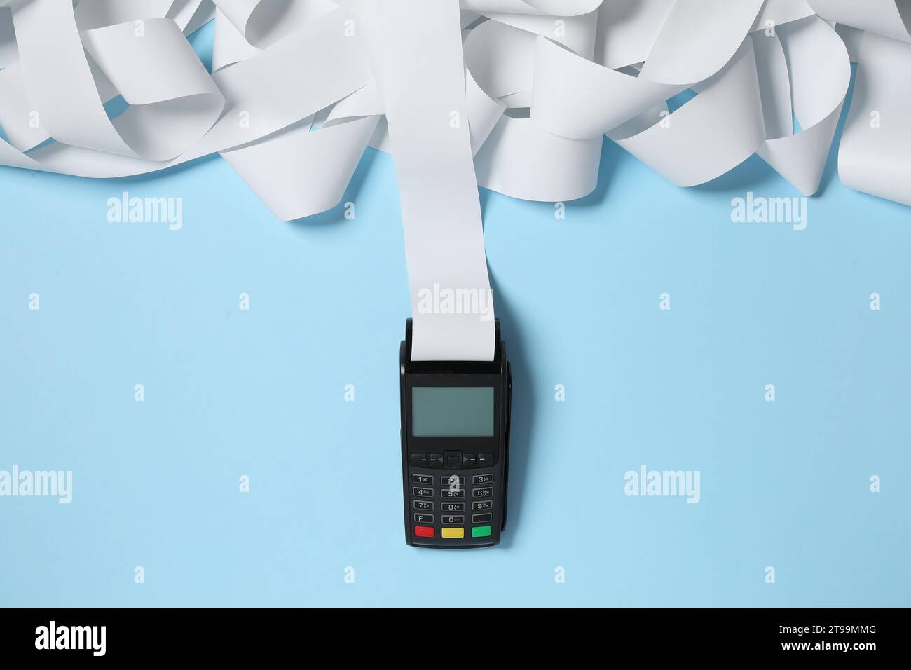 Payment terminal with thermal paper for receipt on light blue ...