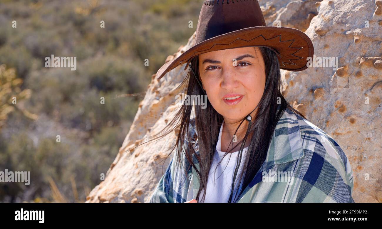 Close up shot of a young woman in a western style outfit in the Arizona ...