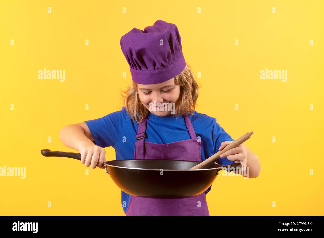 Kid cook with cooking pan. Kid chef cook prepares food on isolated ...