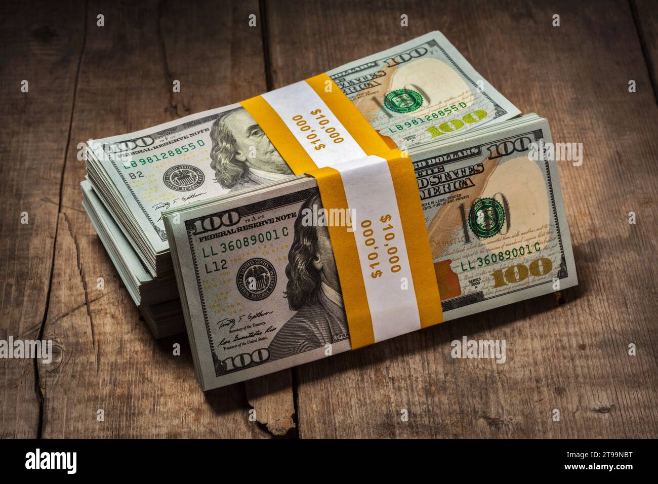 Stacks of 100 dollars banknotes bundles Stock Photo - Alamy