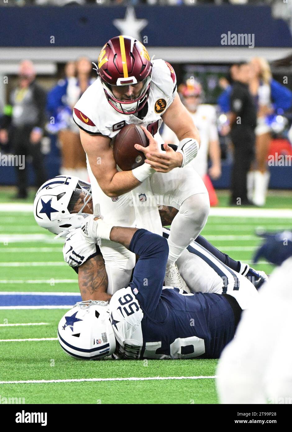 Washington Commanders quarterback Sam Howell gets sacked by Dallas Cowboys Micah Parsons and ...