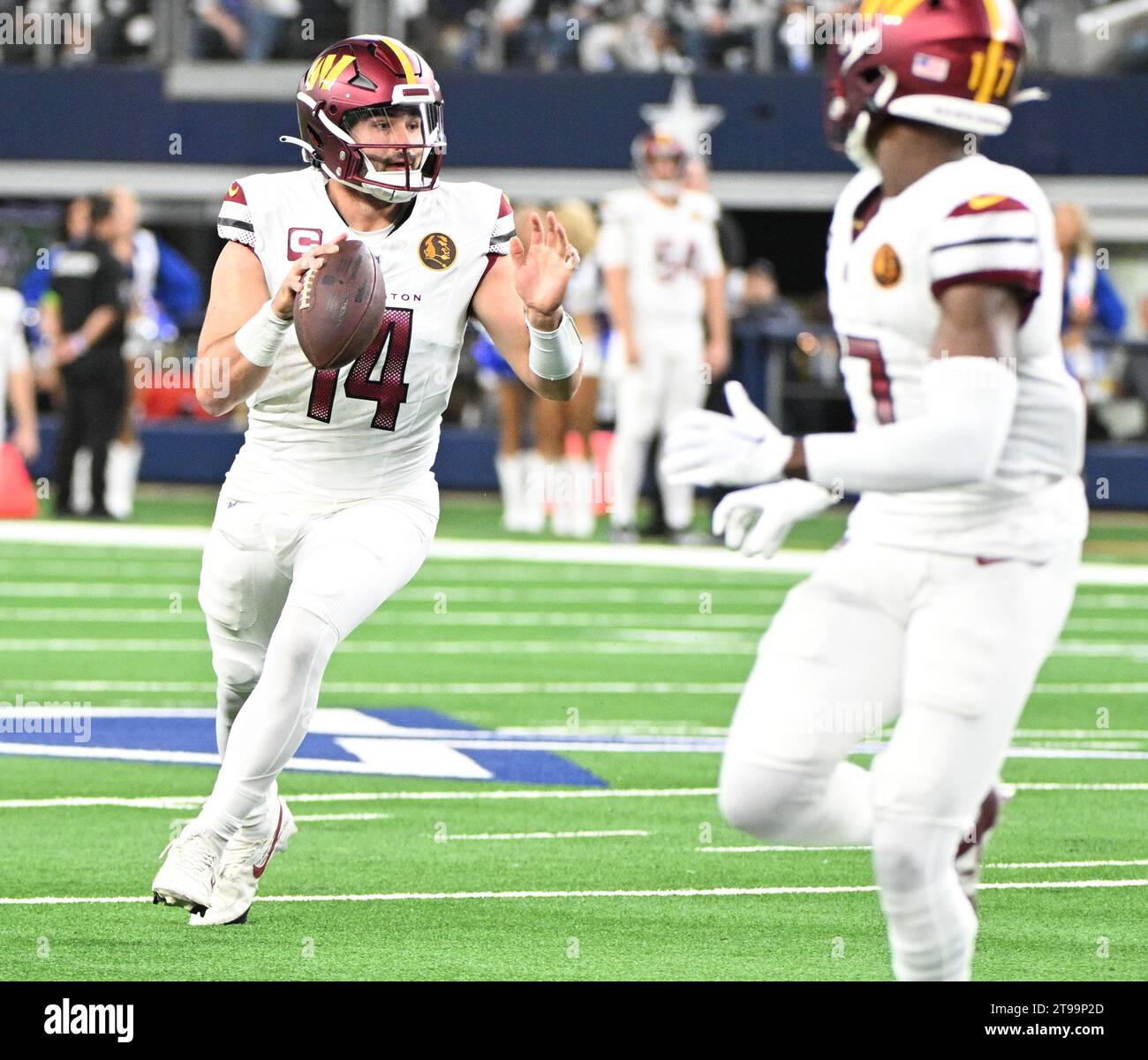 Washington Commanders Sam Howell scrambles against the Dallas Cowboys ...