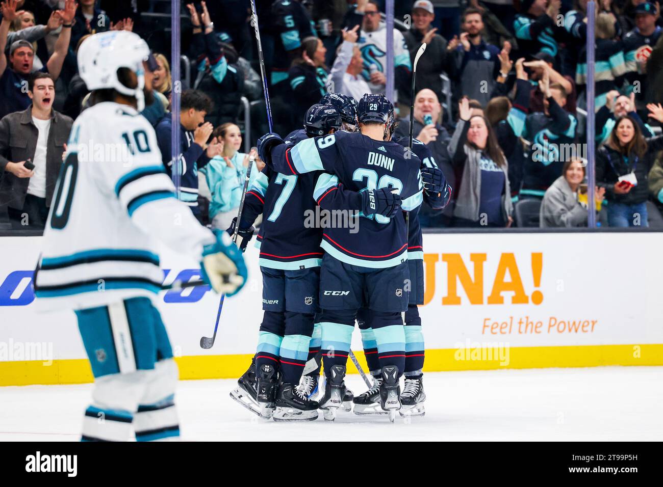 Seattle Kraken defenseman Vince Dunn (29) celebrates with teammates ...