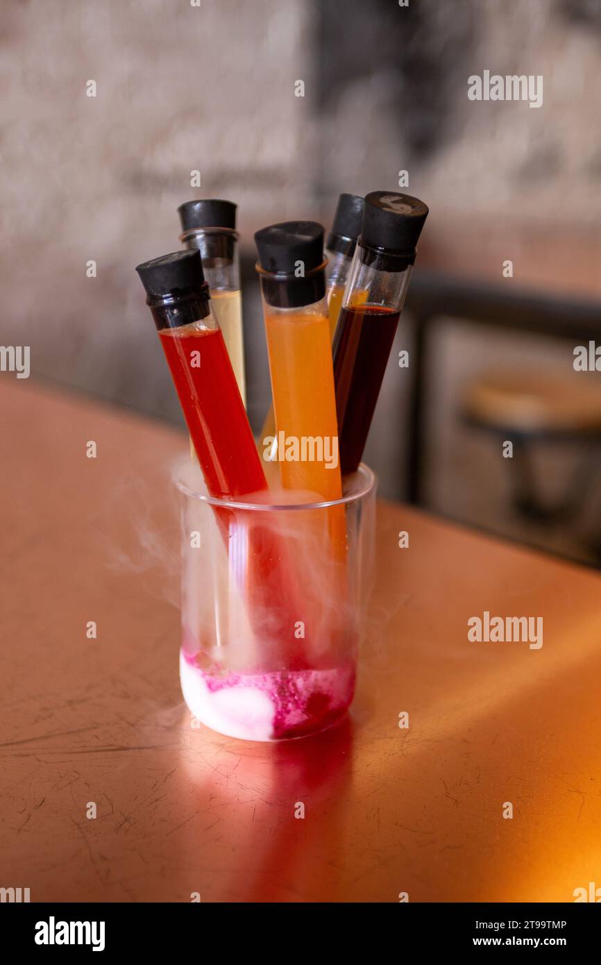 Science experiment of shots with fire on dry ice Stock Photo - Alamy