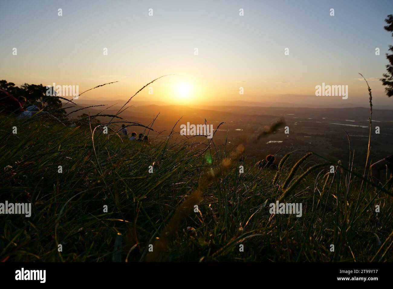 Lens flare in mountains orange hi-res stock photography and images - Alamy