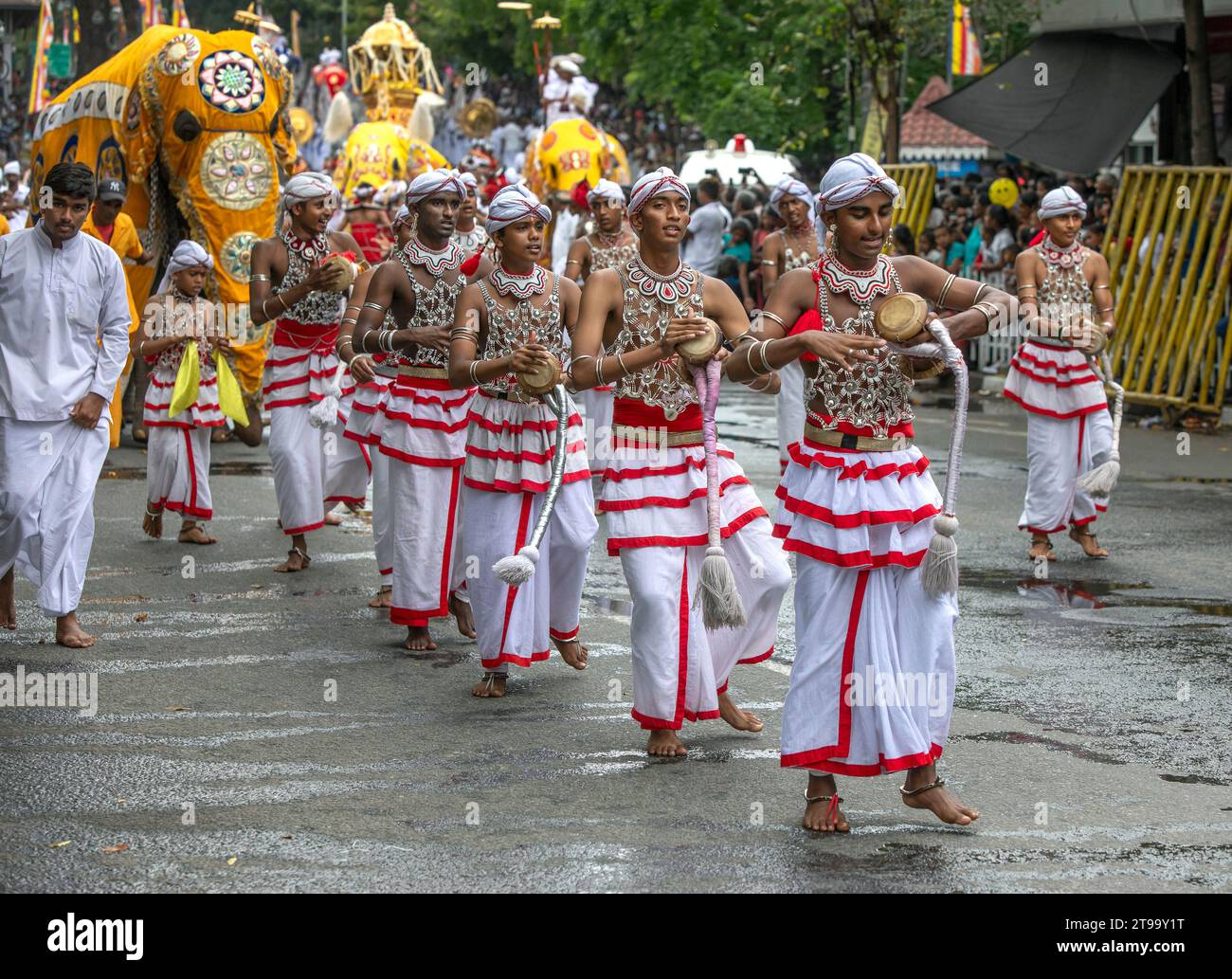 Udekki dancers perform along a street of Kandy in Sri Lanka during the ...