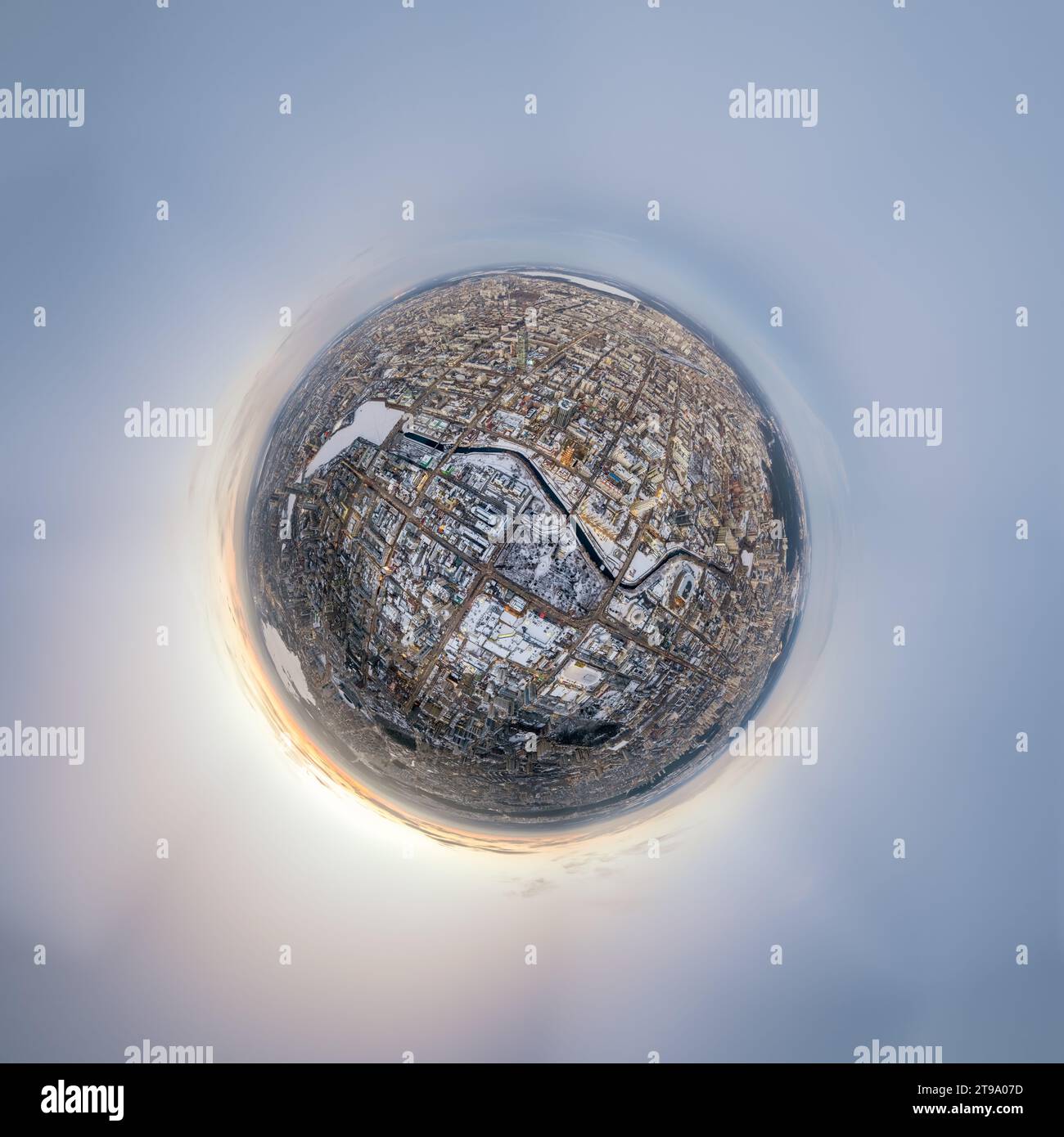 Aerial winter city view with crossroads and roads, houses, buildings ...