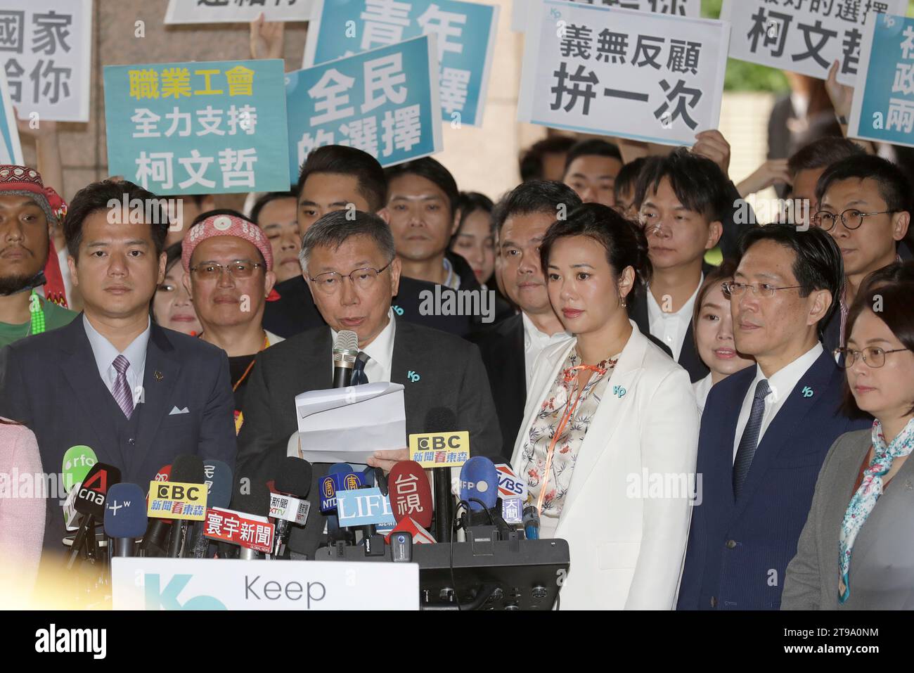Taiwan's Taiwan People's Party (TPP) presidential candidate Ko Wen-je, center left, with his ...
