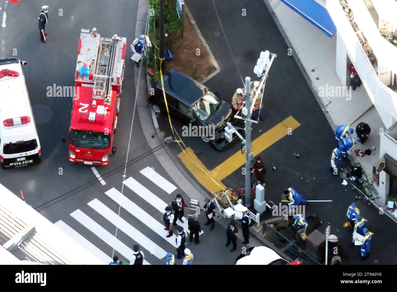 An aerial photo shows an accident scene where a car collided with a ...