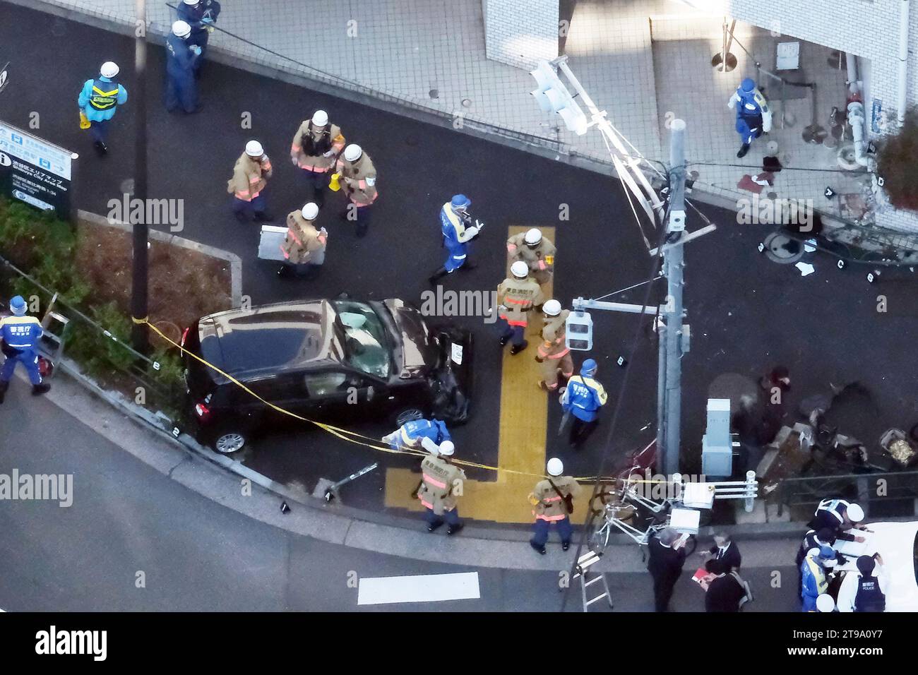 An aerial photo shows an accident scene where a car collided with a ...