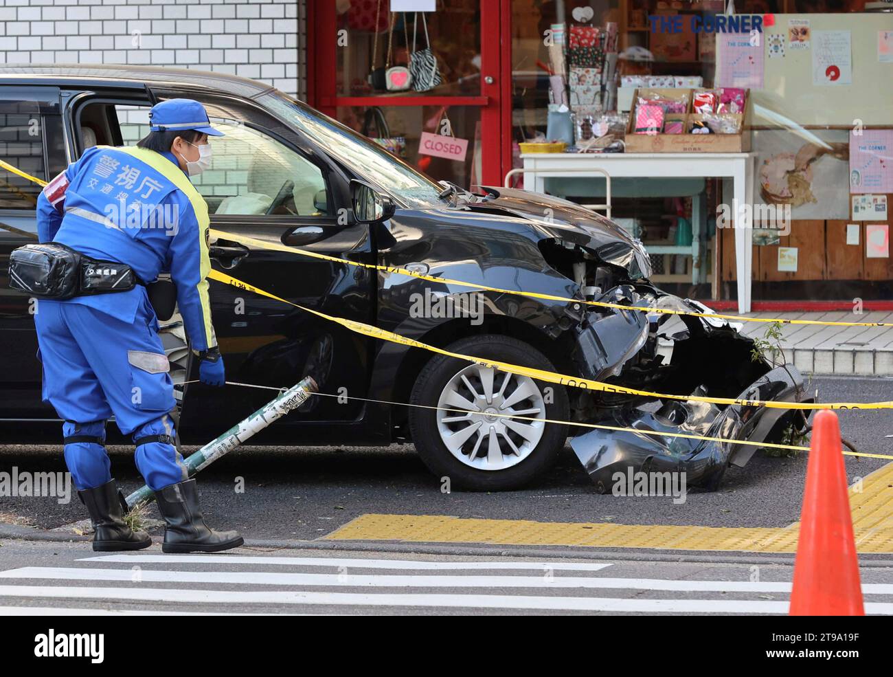A photo shows an accident scene where a car collided with a guardrail ...
