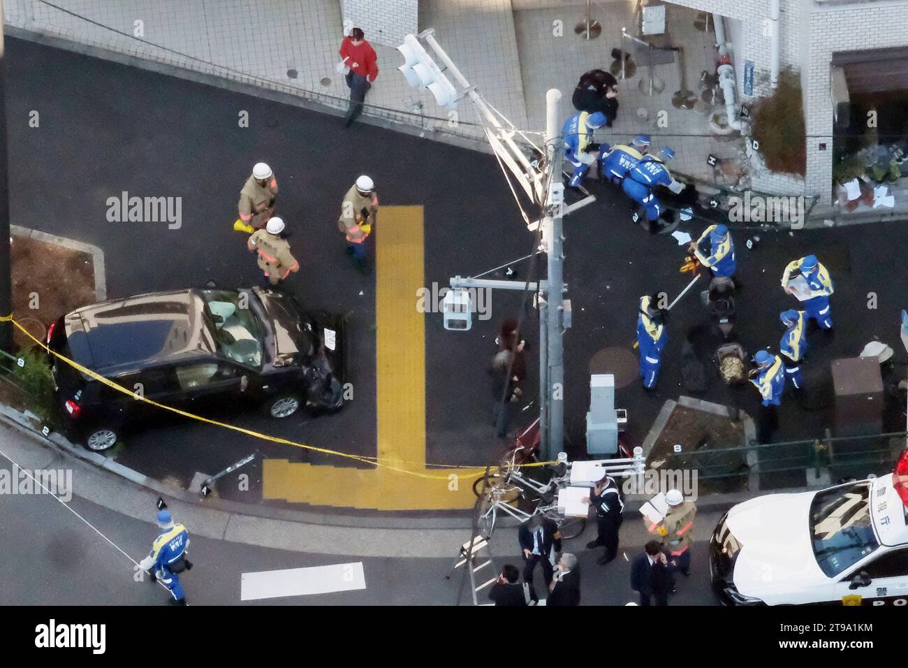 An aerial photo shows an accident scene where a car collided with a ...