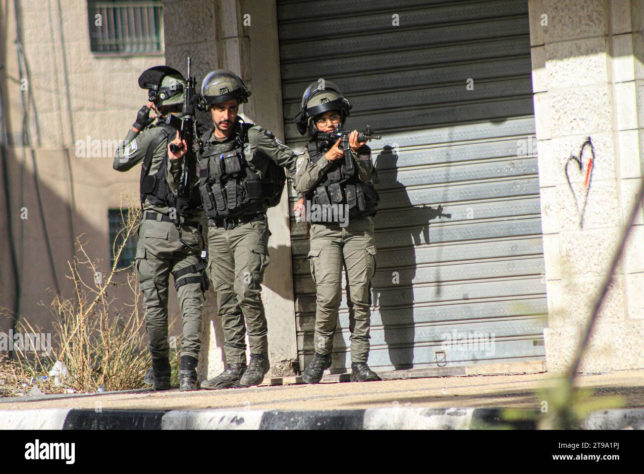 Nablus, Palestine. 23rd Nov, 2023. Israeli border guard force aim there ...