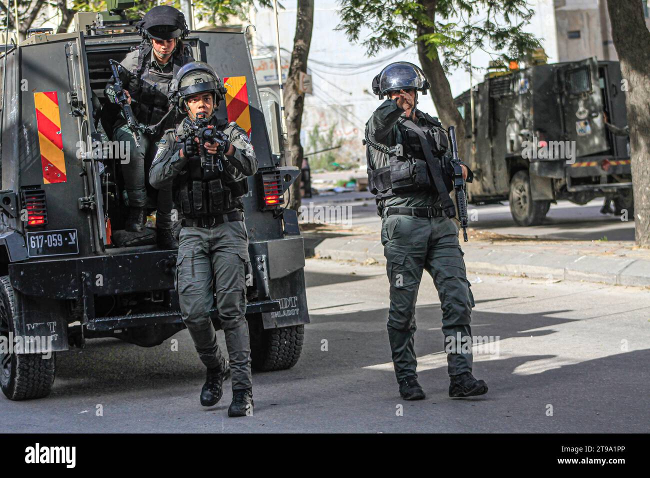 Nablus, Palestine. 23rd Nov, 2023. Israeli border guard force aim there ...