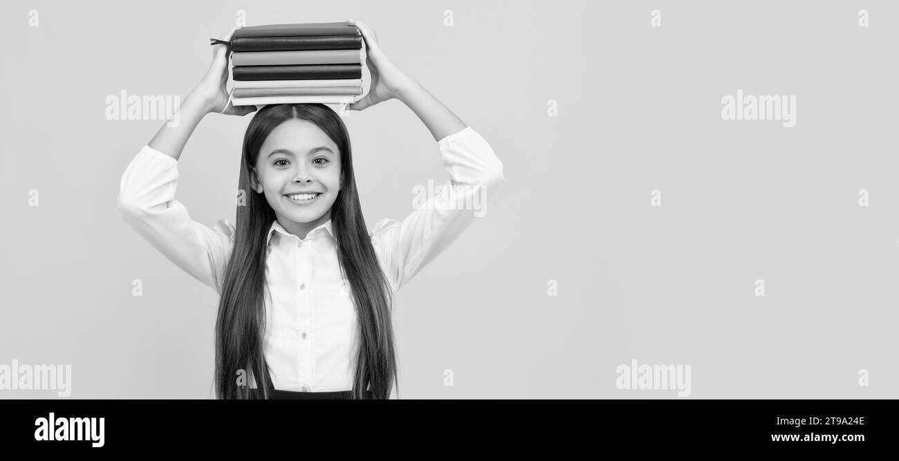 happy teen girl in school uniform hold book stack, knowledge. Portrait ...