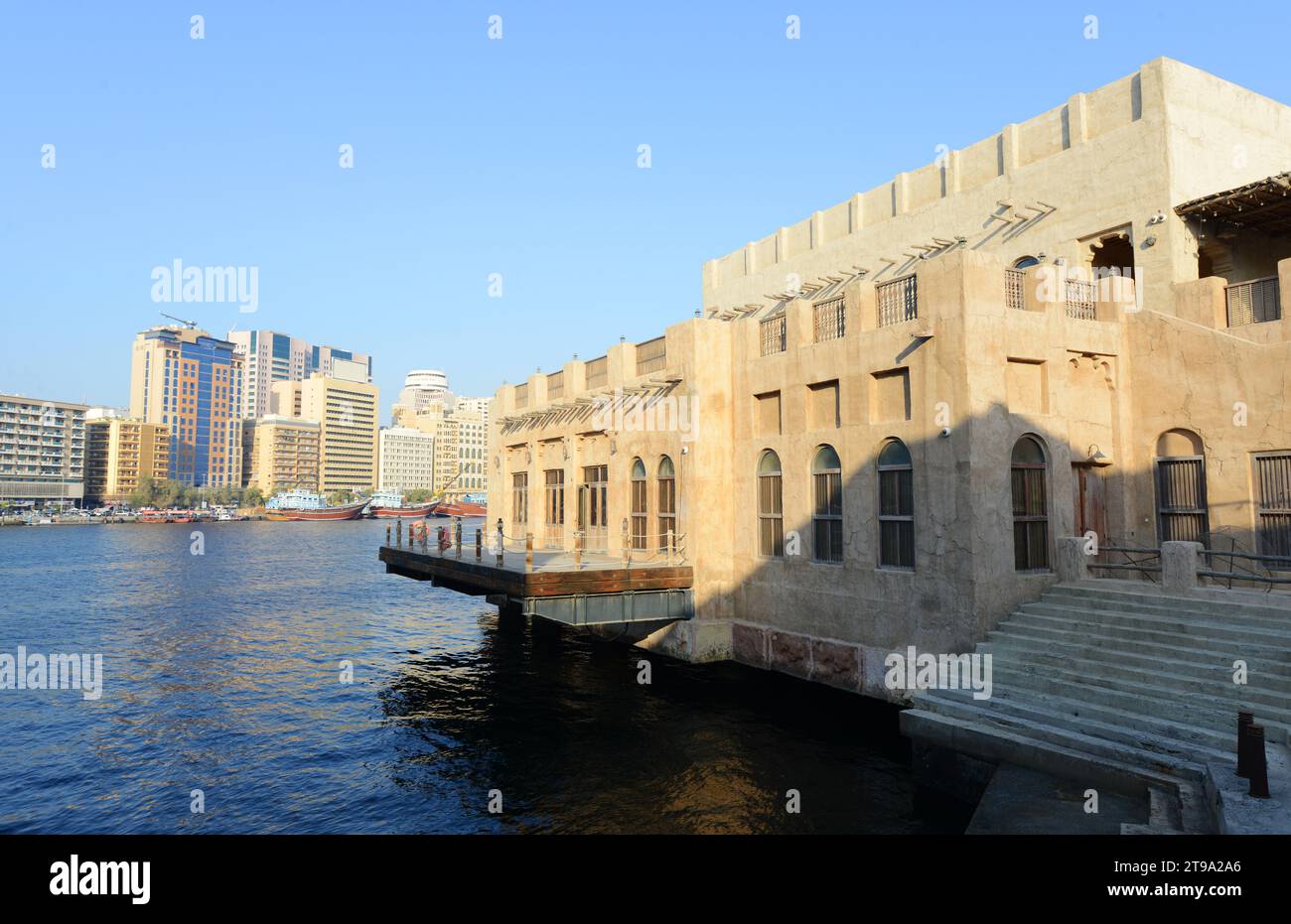Beautiful old buildings in Old Dubai along the Dubai Creek with a view ...