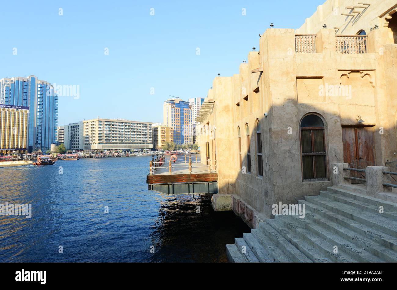 Beautiful old buildings in Old Dubai along the Dubai Creek with a view ...