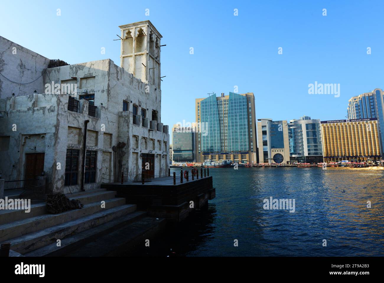 Beautiful old buildings in Old Dubai along the Dubai Creek with a view ...