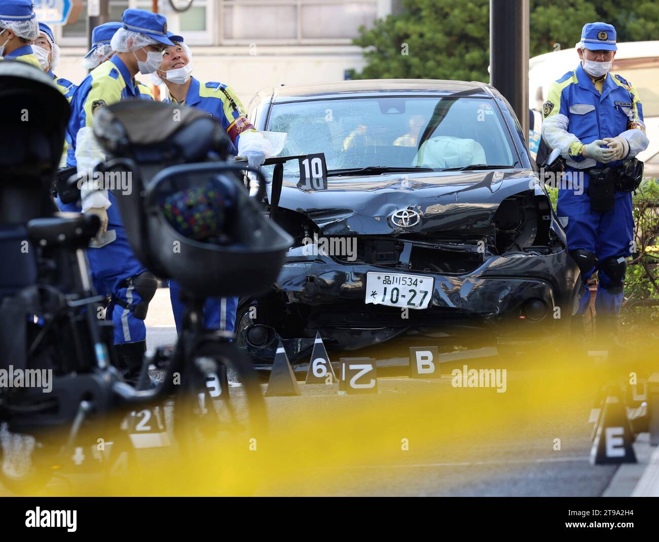 A photo shows an accident scene where a car collided with a guardrail ...