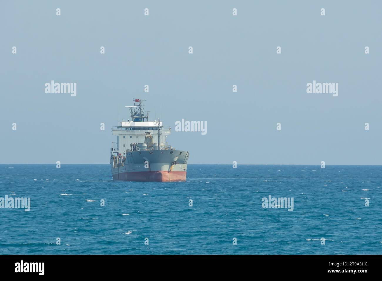 Front side view of oil tanker ship sailing on open sea Stock Photo - Alamy