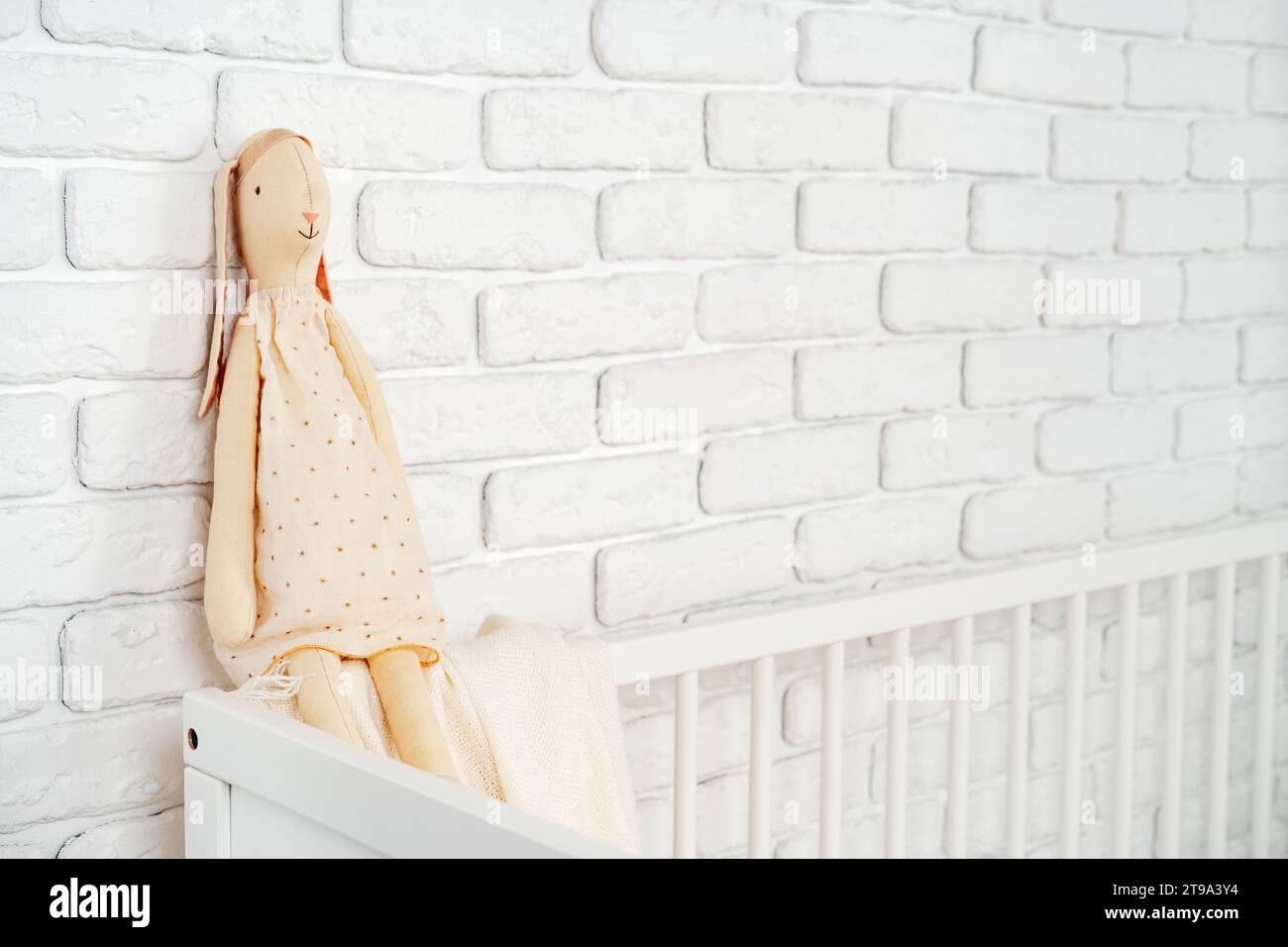 Soft toy in cot bed hi-res stock photography and images - Alamy