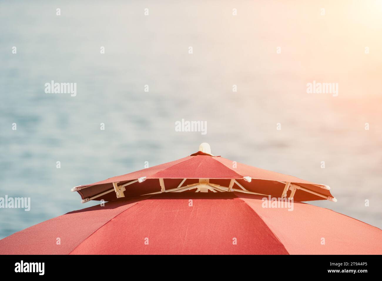 Red Beach Umbrella on the Background of the Blue Sea Ocean. Beach ...