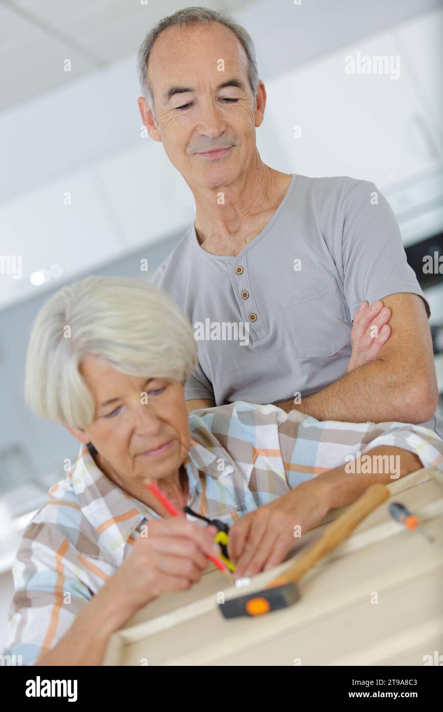 senior couple doing diy together Stock Photo - Alamy