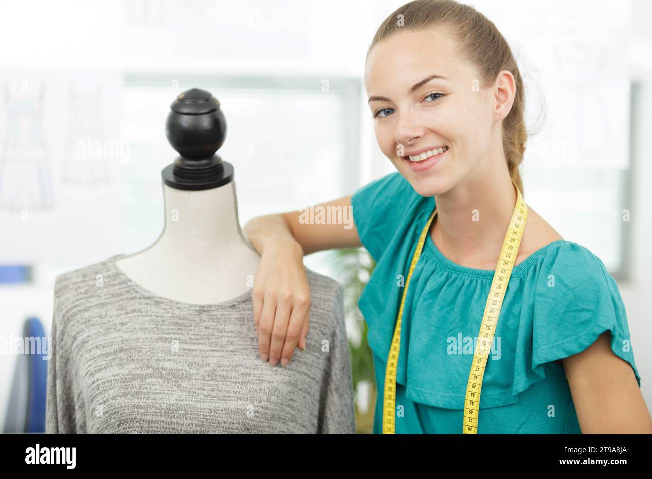 a portrait of female tailor Stock Photo - Alamy