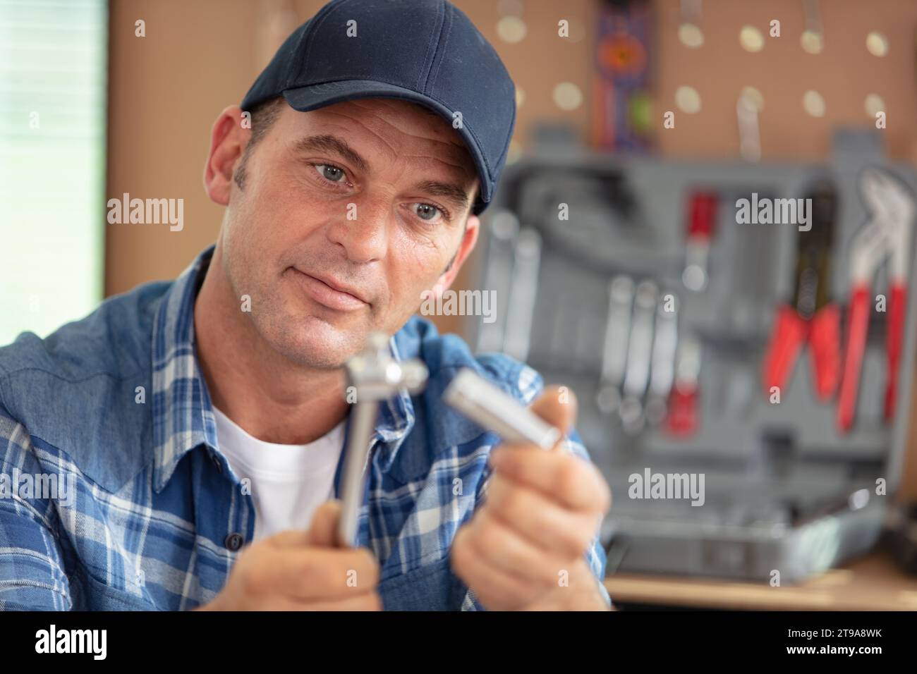 Mature male artisan holding hi-res stock photography and images - Alamy
