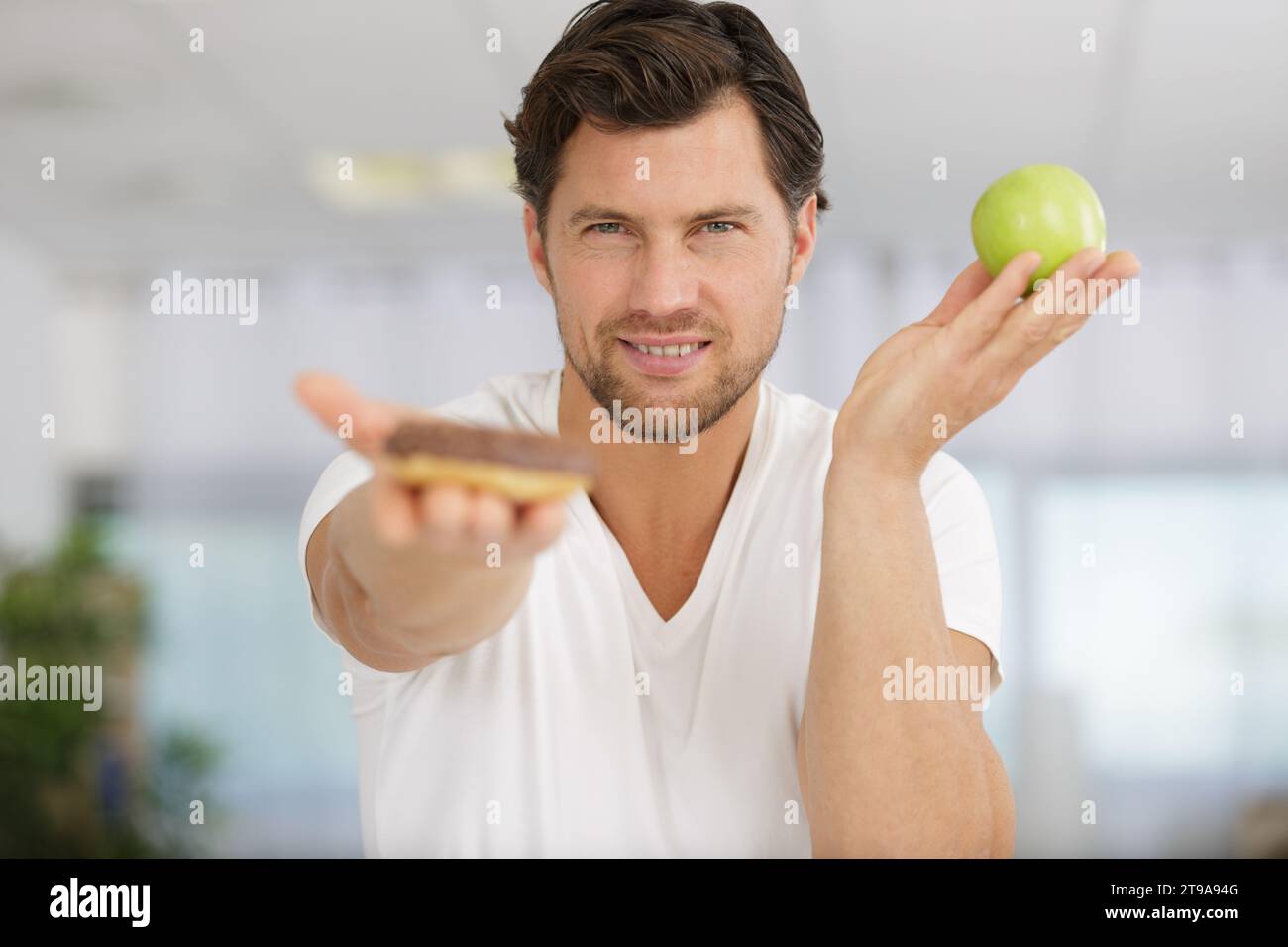picture of man giving doughnut Stock Photo - Alamy