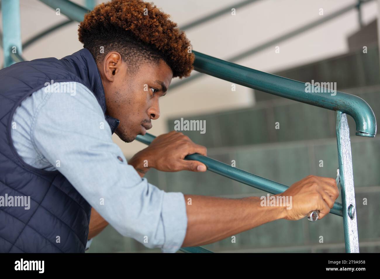 construction worker working on stairs Stock Photo - Alamy
