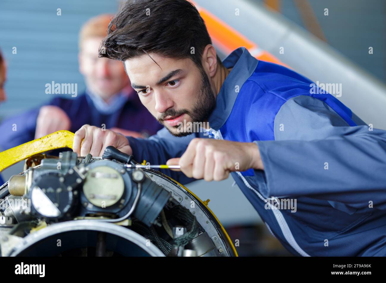 Young man cleaning steel hi-res stock photography and images - Alamy