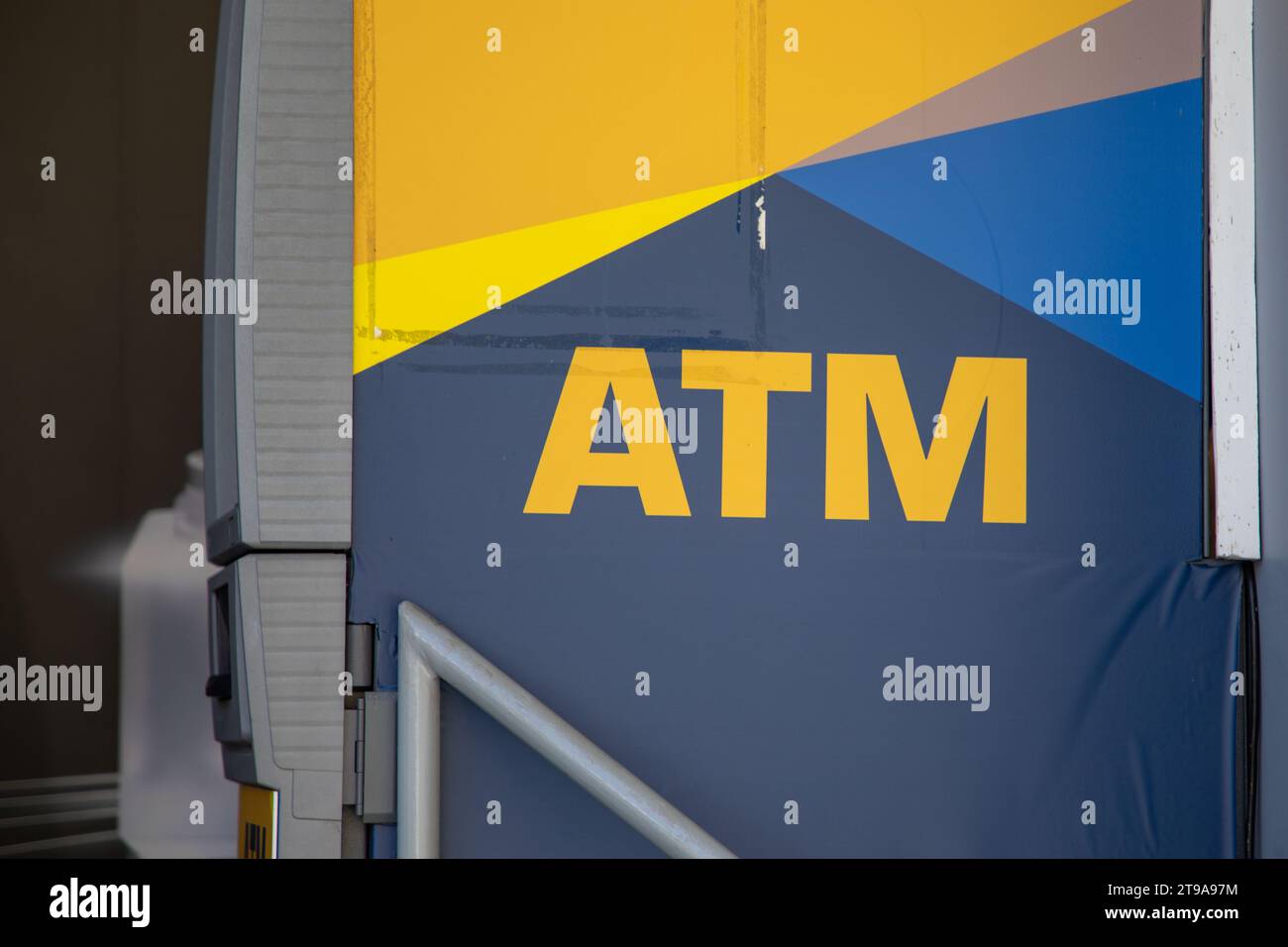 ATM text sign outside wall facade bank agency Stock Photo - Alamy