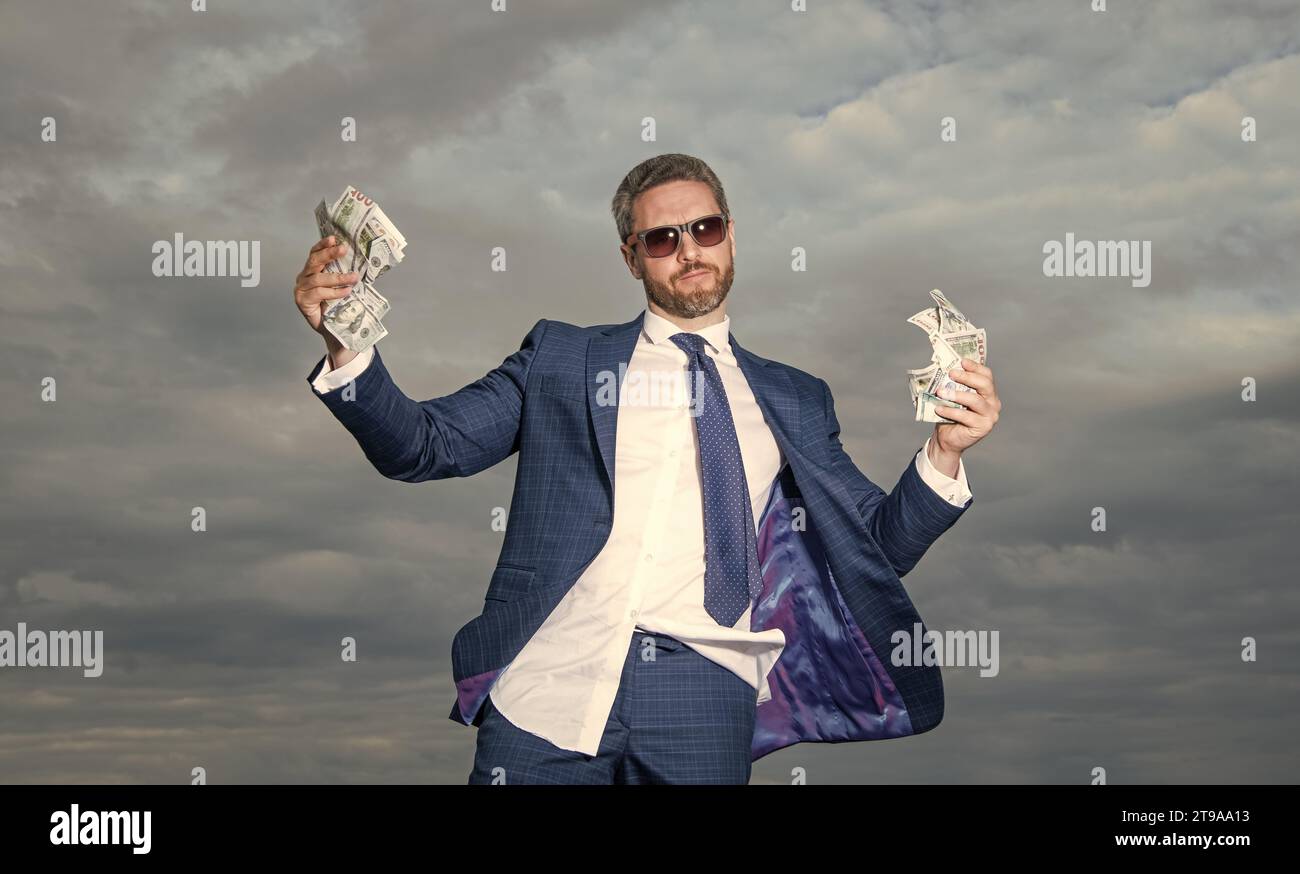 millionaire man with money on sky background. millionaire man with ...