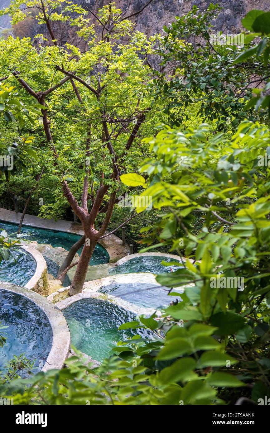 Explore serene beauty of Tolantongo Grutas. Lush forests, tranquil ...