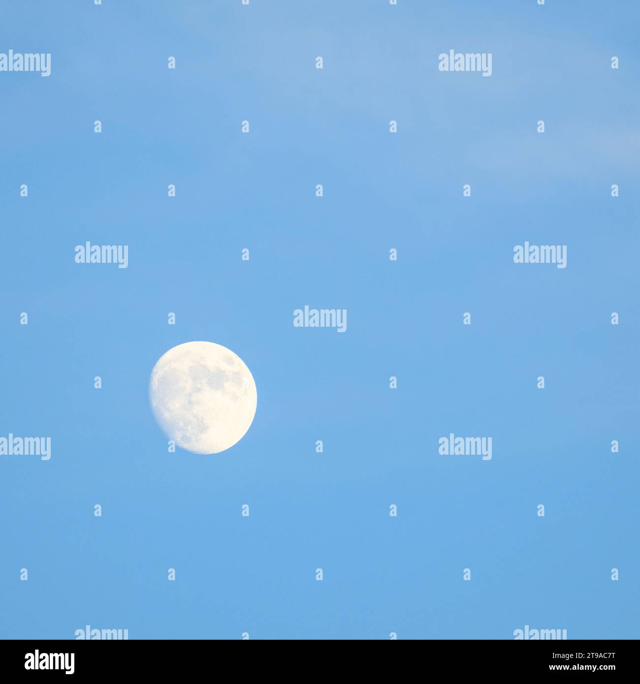 Day time moon on blue sky background Square Format Stock Photo - Alamy