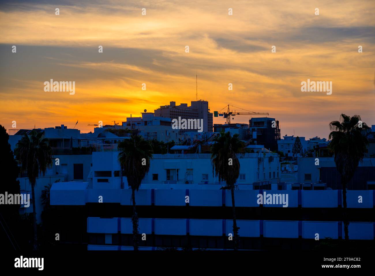 Sunset in Tel Aviv, Israel Looking west from a rooftop In Basel Street ...