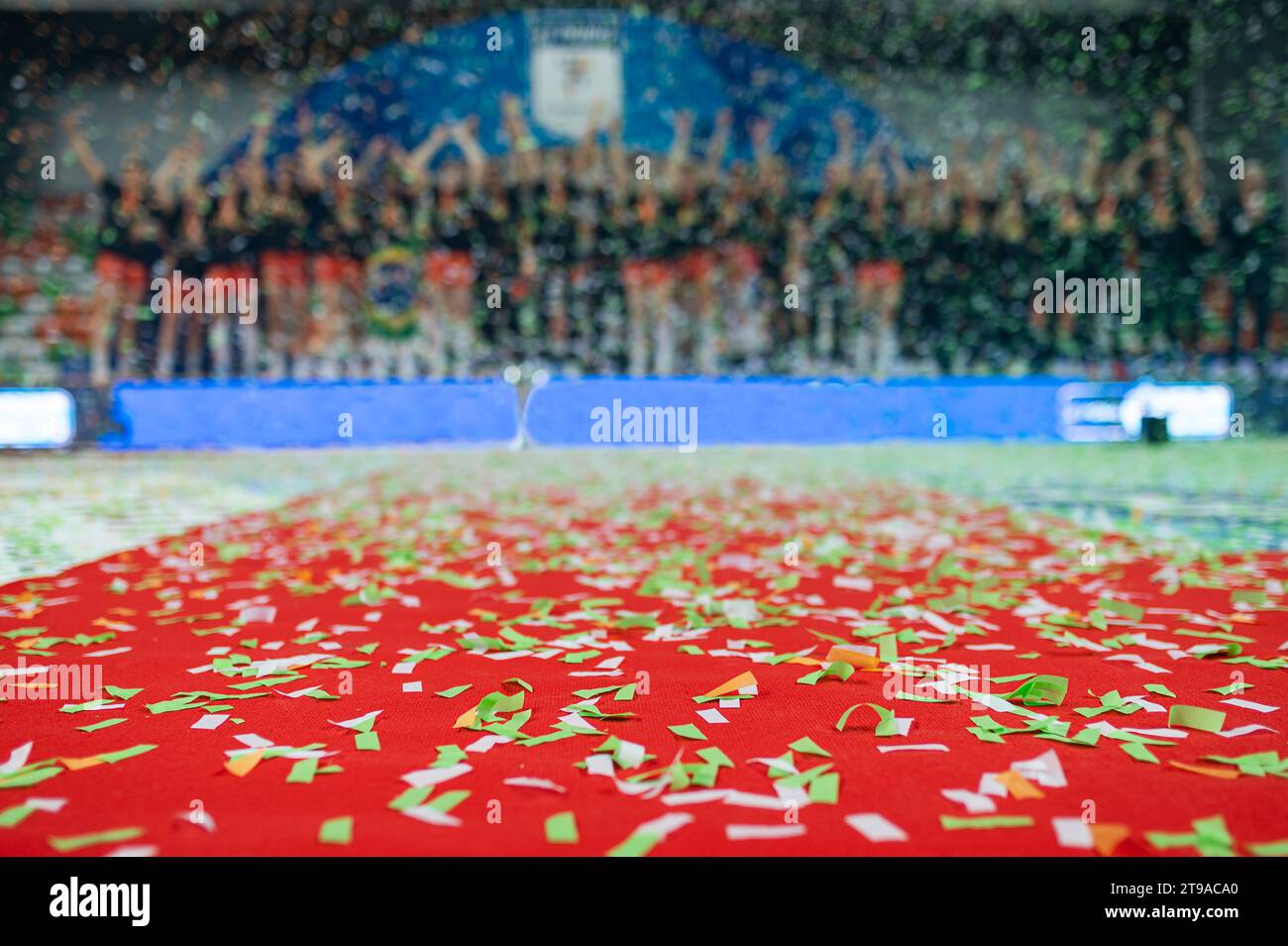 Confetti on the red carpet and team of sports chamions in the ...