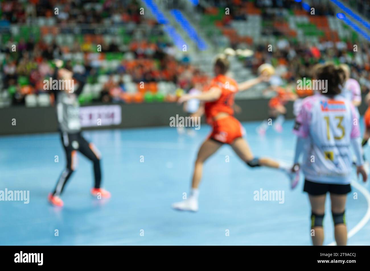 handball woman player attacks during match - intentional blurry Stock ...