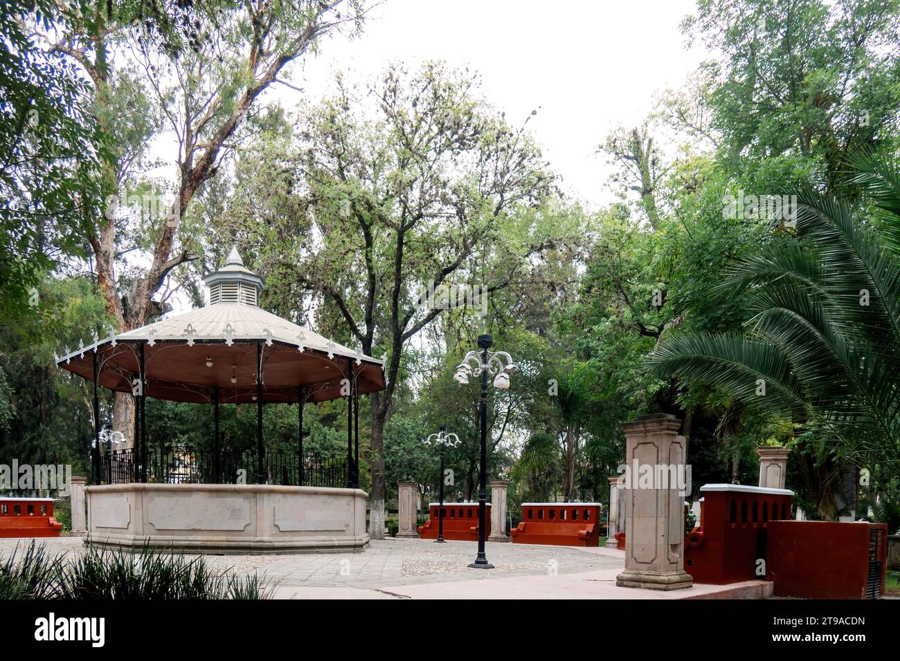 Discover the allure of the kiosk surrounded by lush greenery at Alameda ...