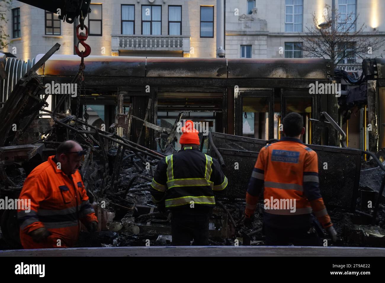 A burned out Luas is removed from O'Connell Street in Dublin, in the ...
