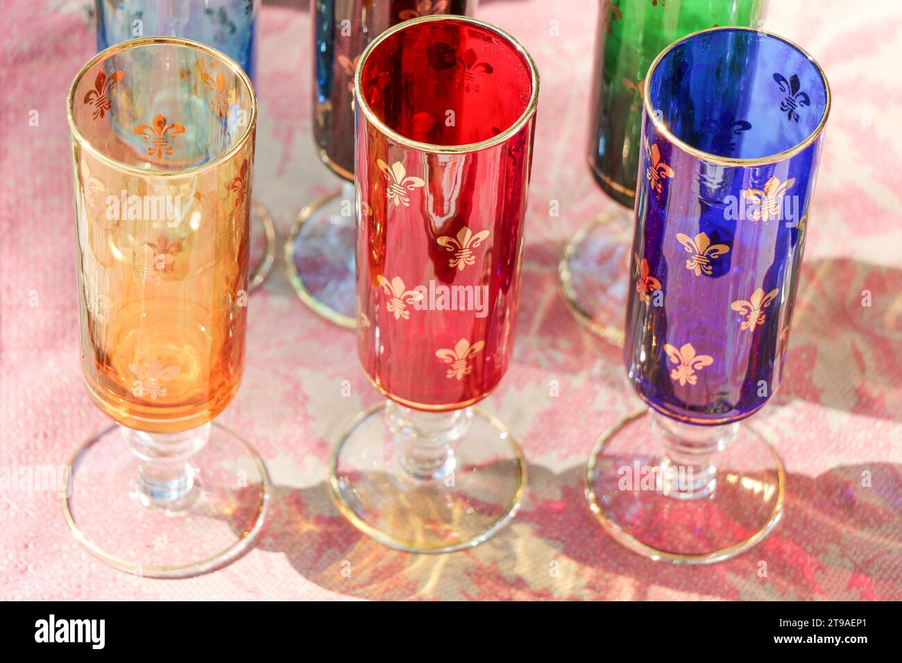 Drinking glasses of various color with patterns Stock Photo - Alamy