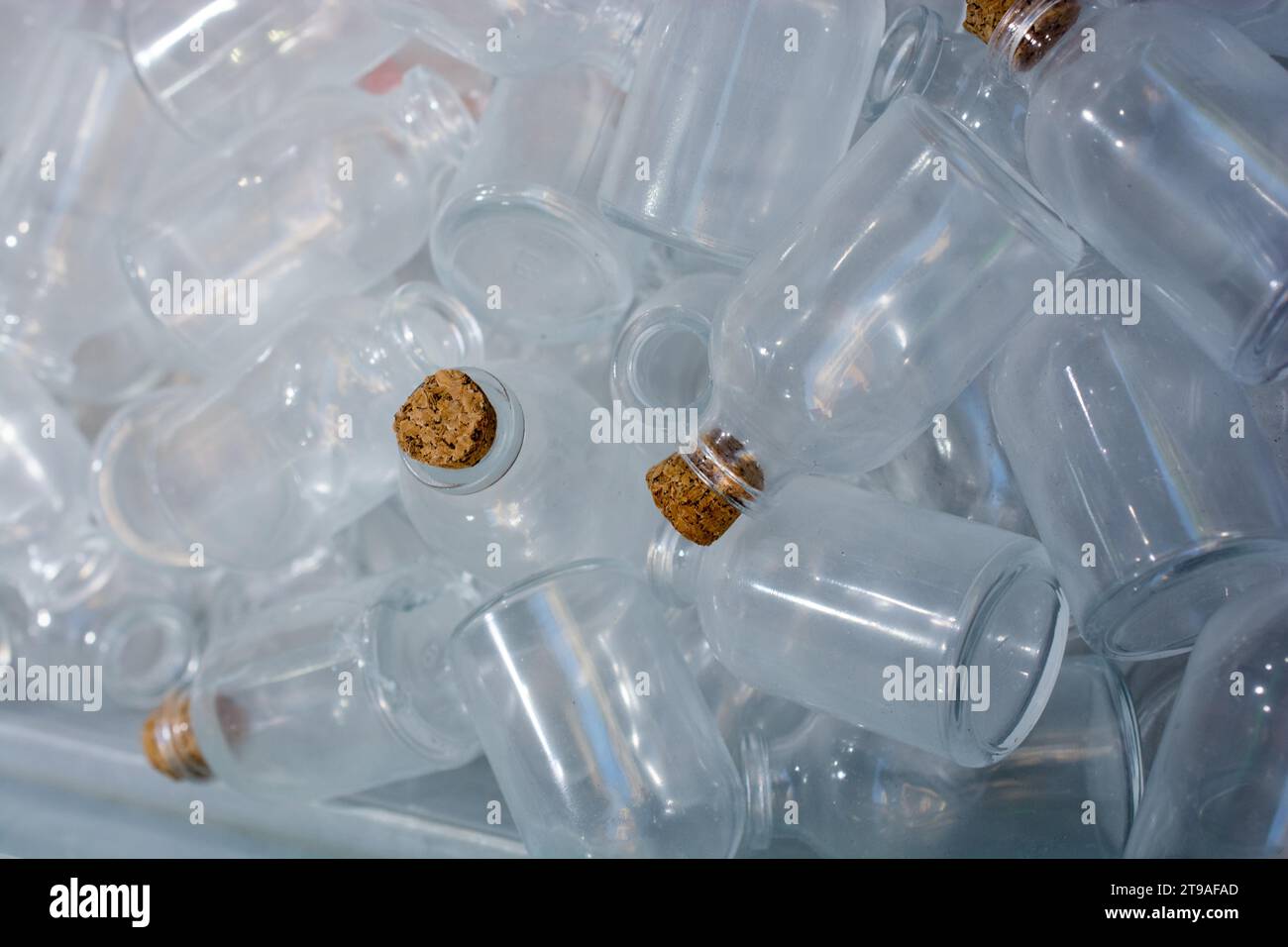 Set of Empty small transparent bottles Stock Photo - Alamy
