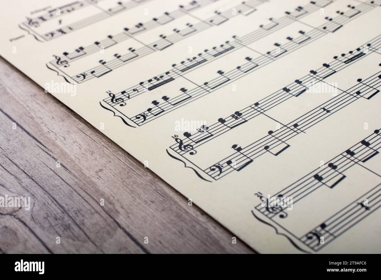 Musical notes on paper placed on a linen canvas Stock Photo - Alamy