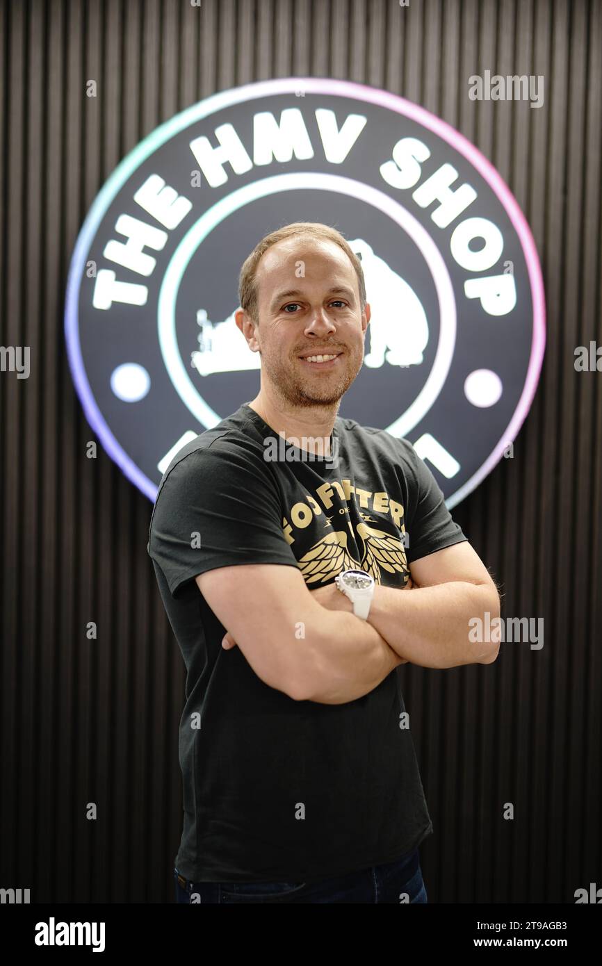 Doug Putman, the owner of HMV, poses inside the new HMV store, which ...