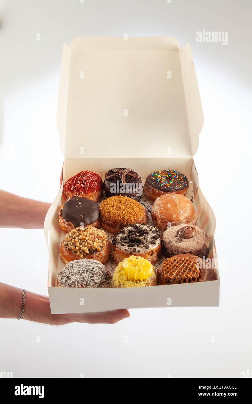 Box of twelve full sized doughnuts assorted brioche and fancy with ...
