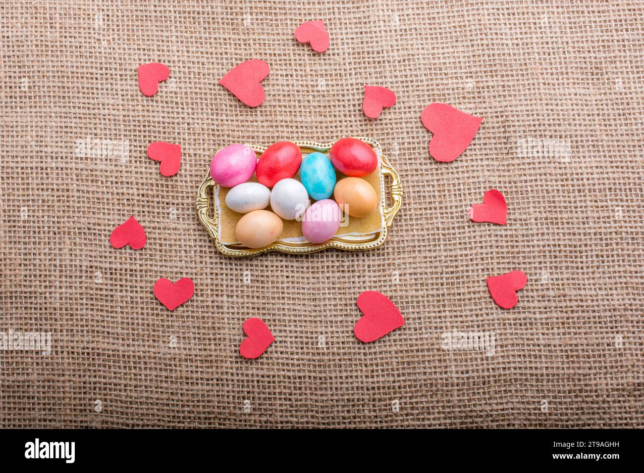 Paper heart and colorful candy sweets in tray Stock Photo - Alamy
