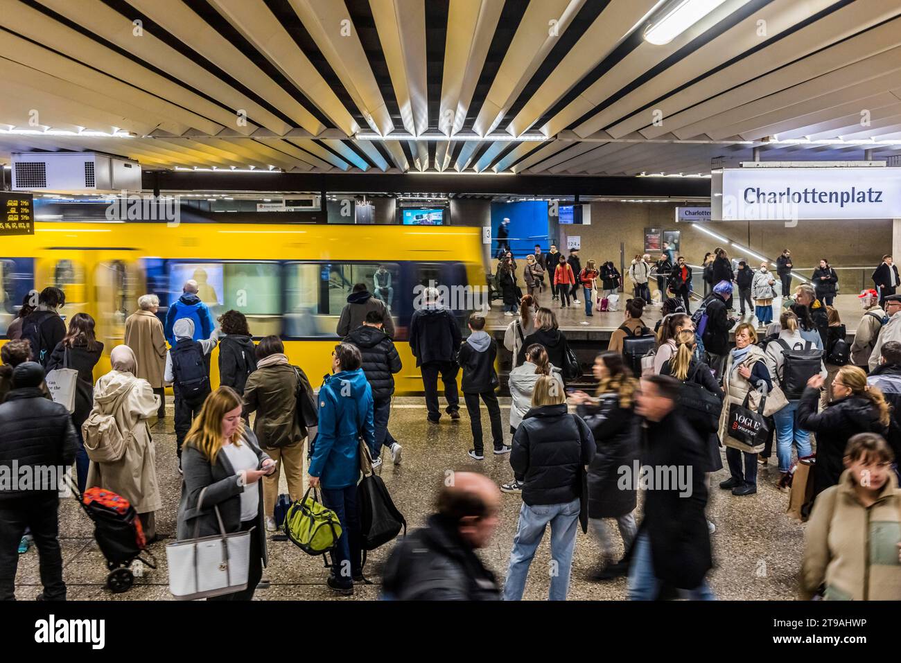 Public transport with many passengers and commuters, Charlottenplatz ...