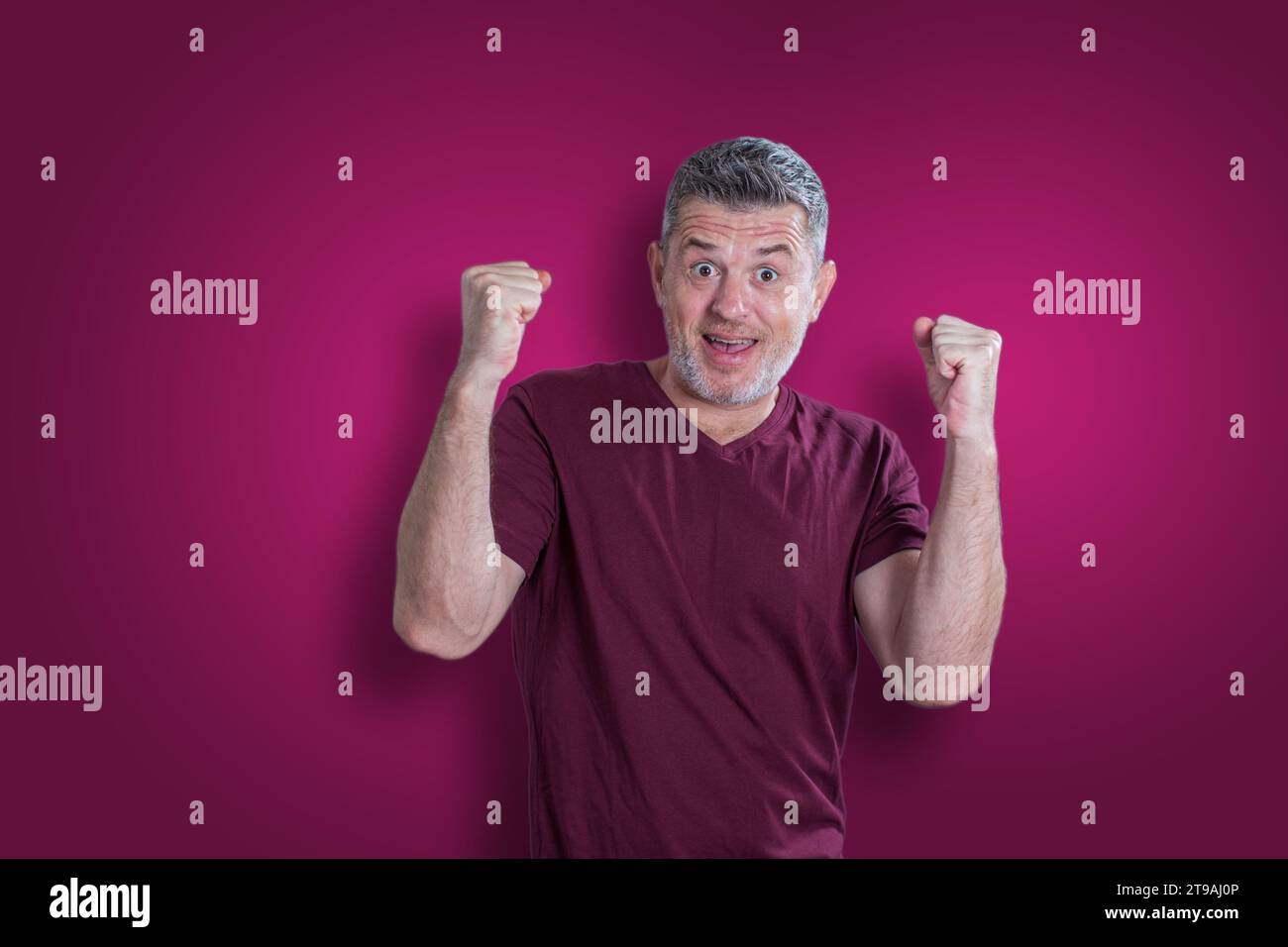 Excited and happy man standing with raised hands. Emotion concept Stock ...